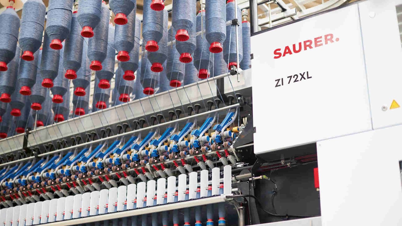 Saurer at ITMA 2023 for shaping the future of textiles - Textilegence